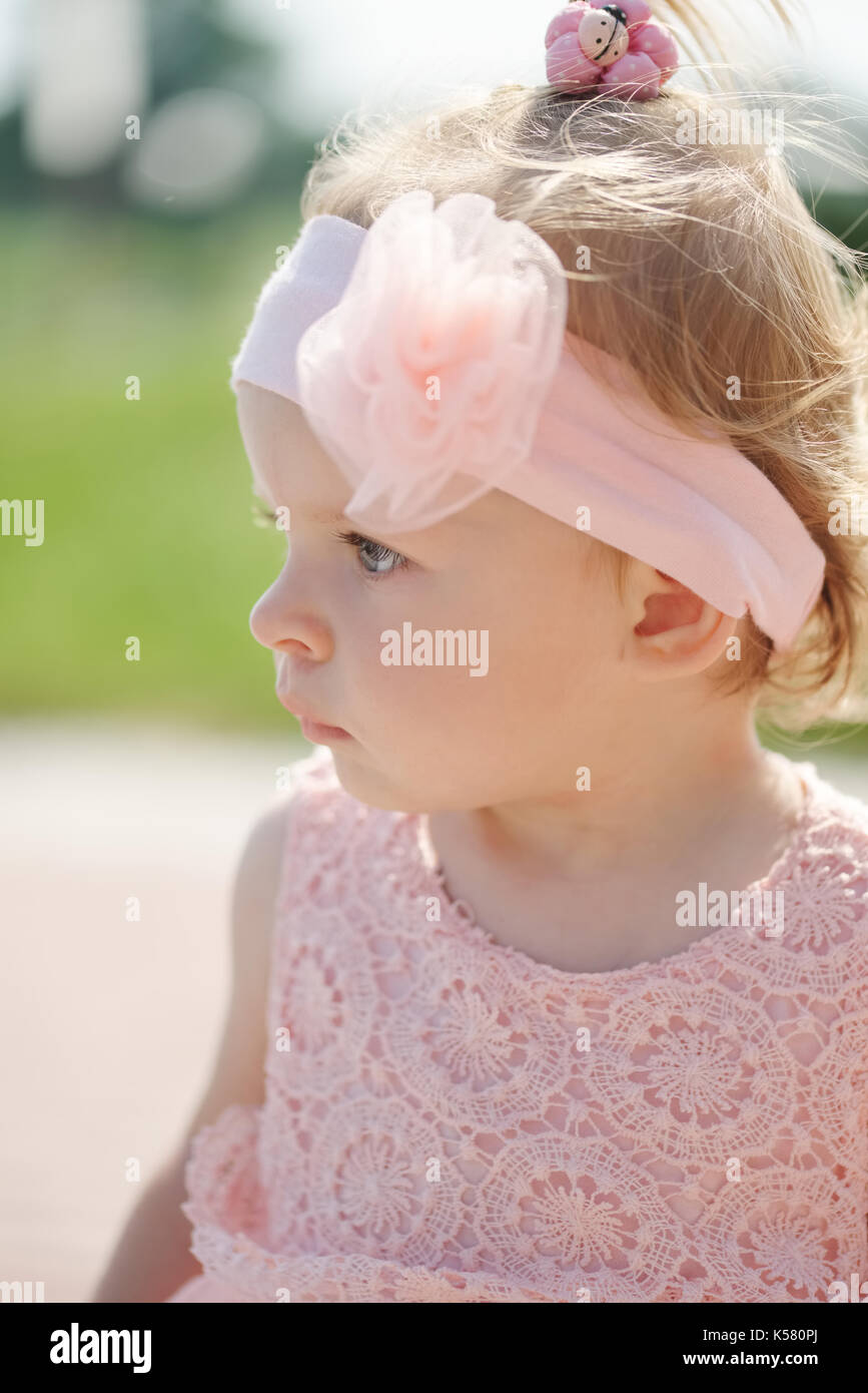 beautiful girl with flower on band Stock Photo - Alamy