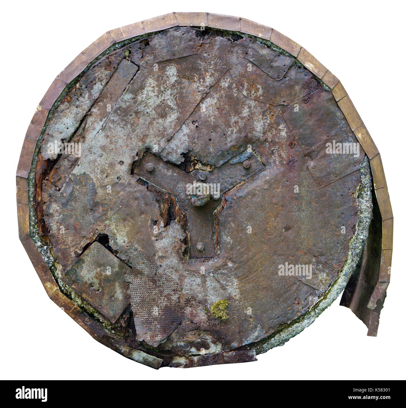 Abandoned old millstone with rusted metal rim. Isolated on white with ...