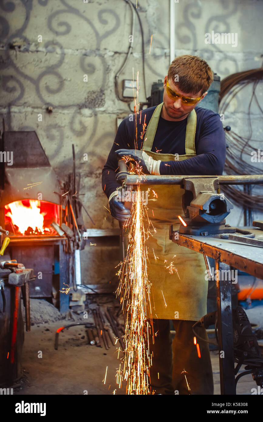 Working saws iron sparks Stock Photo - Alamy