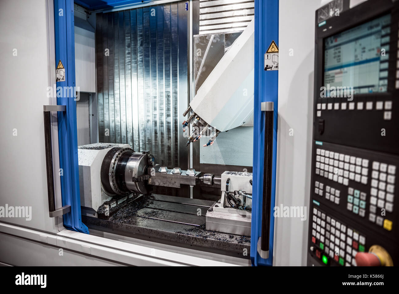 Metalworking CNC milling machine. Cutting metal modern processing ...