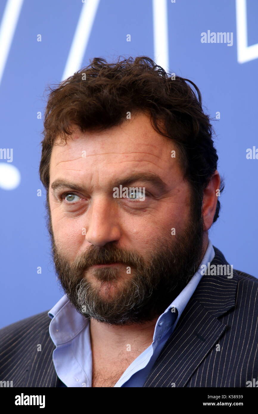 Venice, Italy. 8th Sep, 2017. Actor Denis Menochet poses during the ...