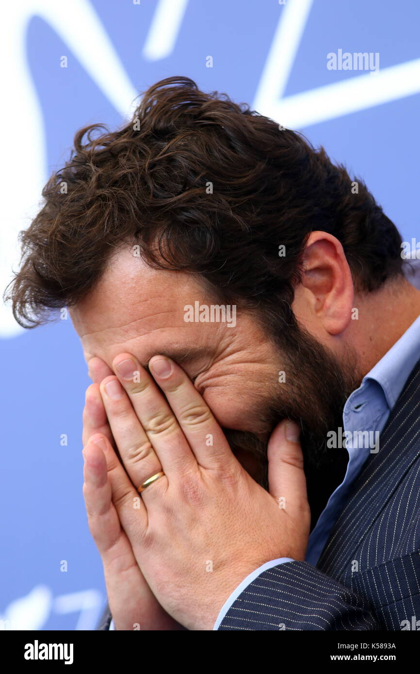 Venice, Italy. 8th Sep, 2017. Actor Denis Menochet poses during the ...