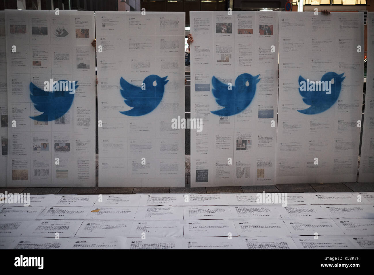 September 8, 2017: Activists hold placard with twitter logo and hate ...