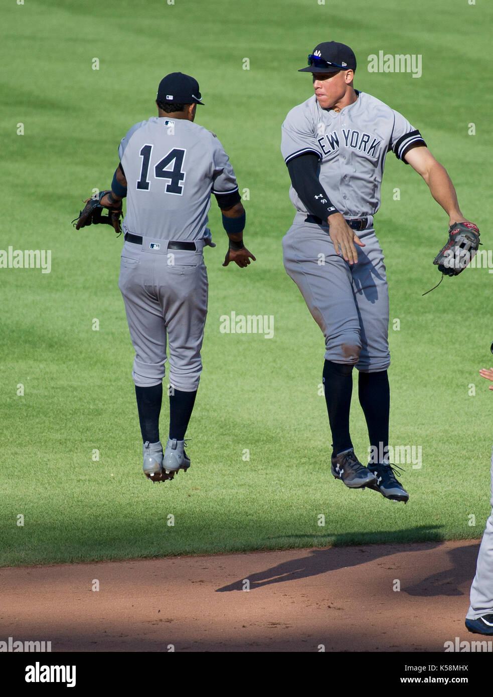 New York Yankees second baseman Starlin Castro (14) and right fielder ...