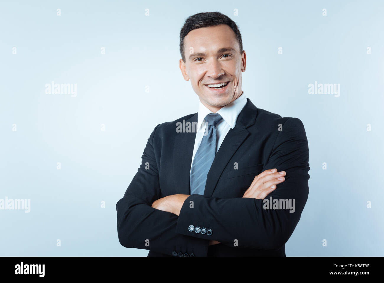Happy positive man smiling Stock Photo - Alamy