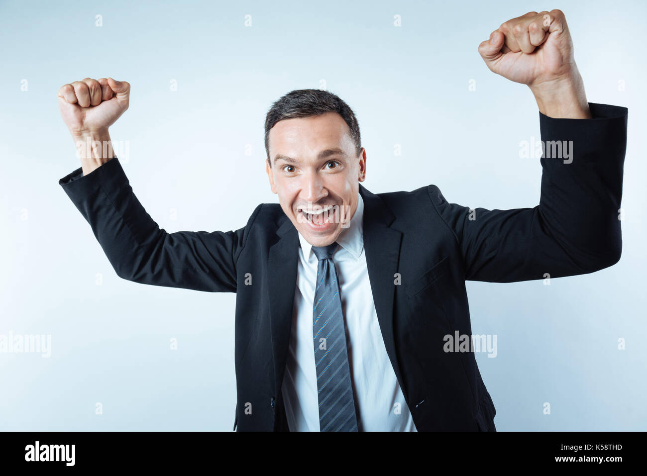 Man holding up arms hi-res stock photography and images - Alamy