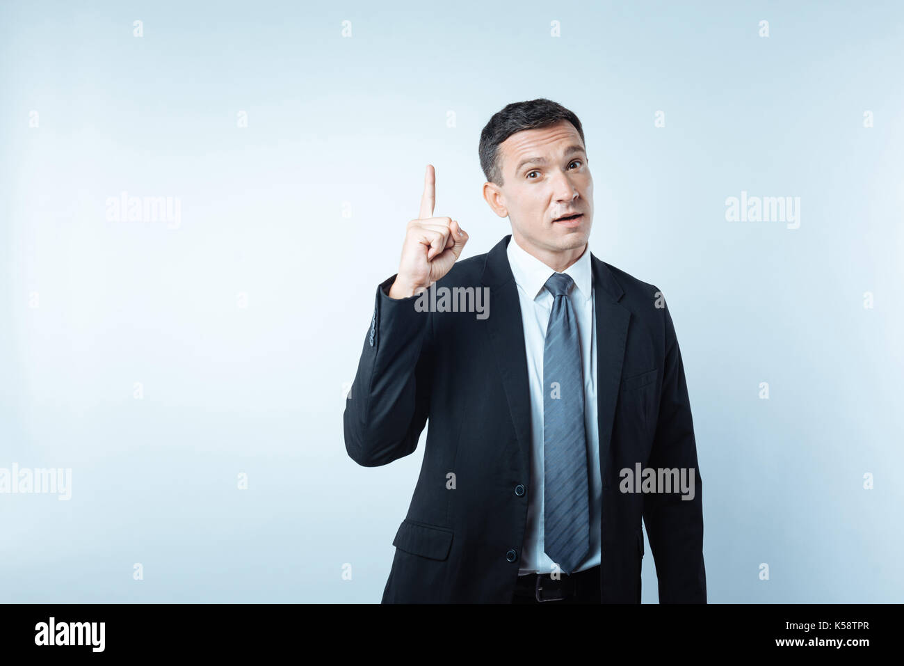 Nice handsome man pointing hi-res stock photography and images - Alamy
