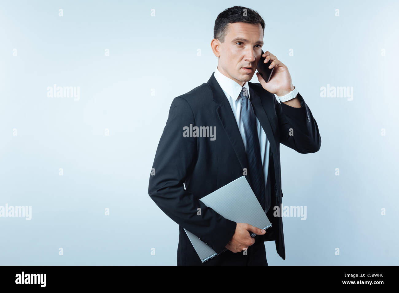 Serious pleasant man talking hi-res stock photography and images - Alamy