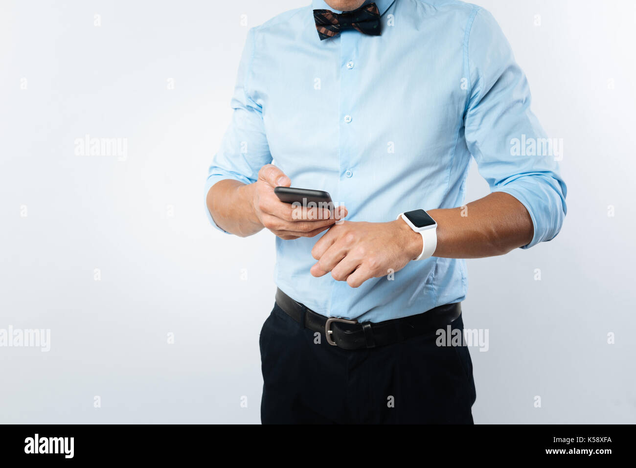 Man setting smartphone hi-res stock photography and images - Alamy