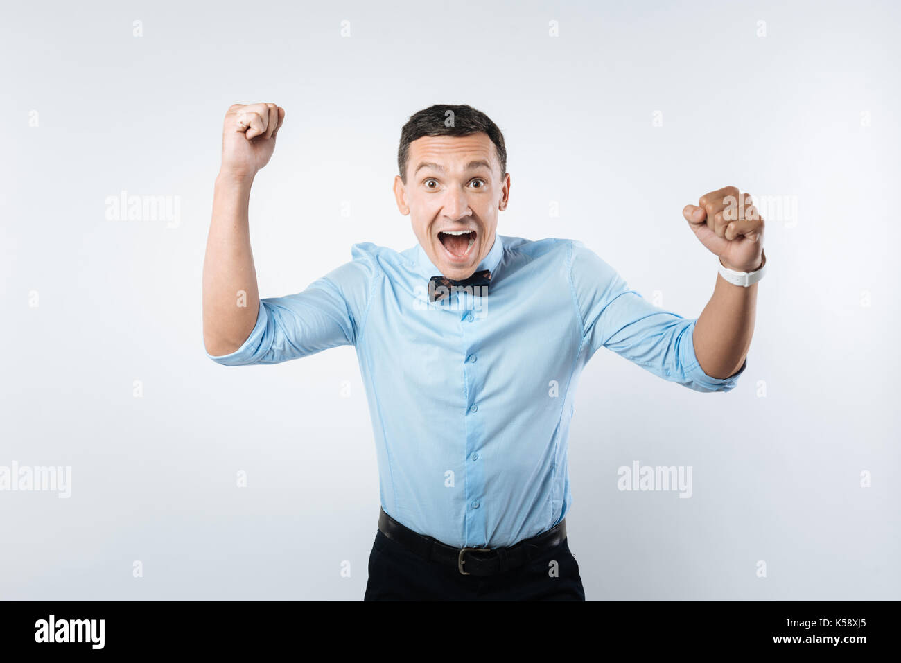 Delighted man hi-res stock photography and images - Alamy