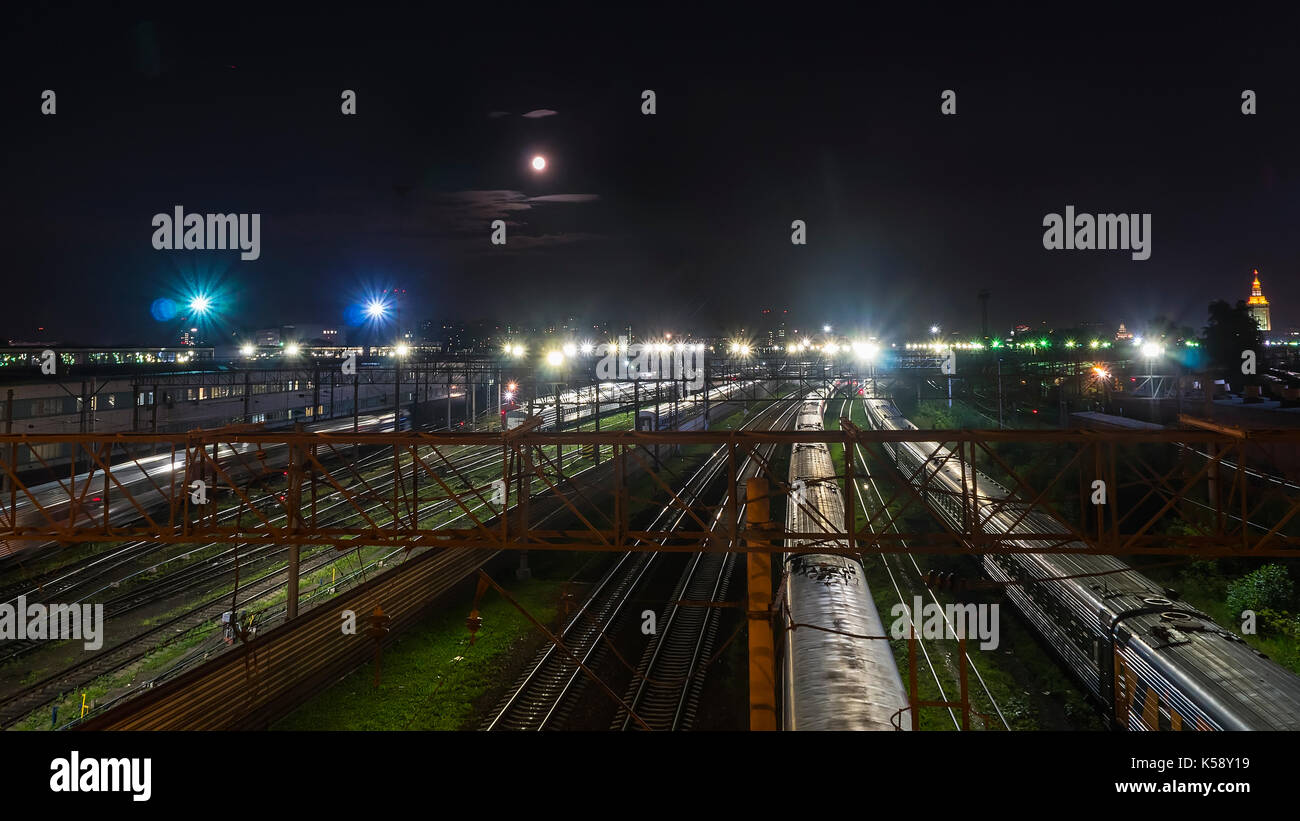 Train passing moon night hi-res stock photography and images - Alamy