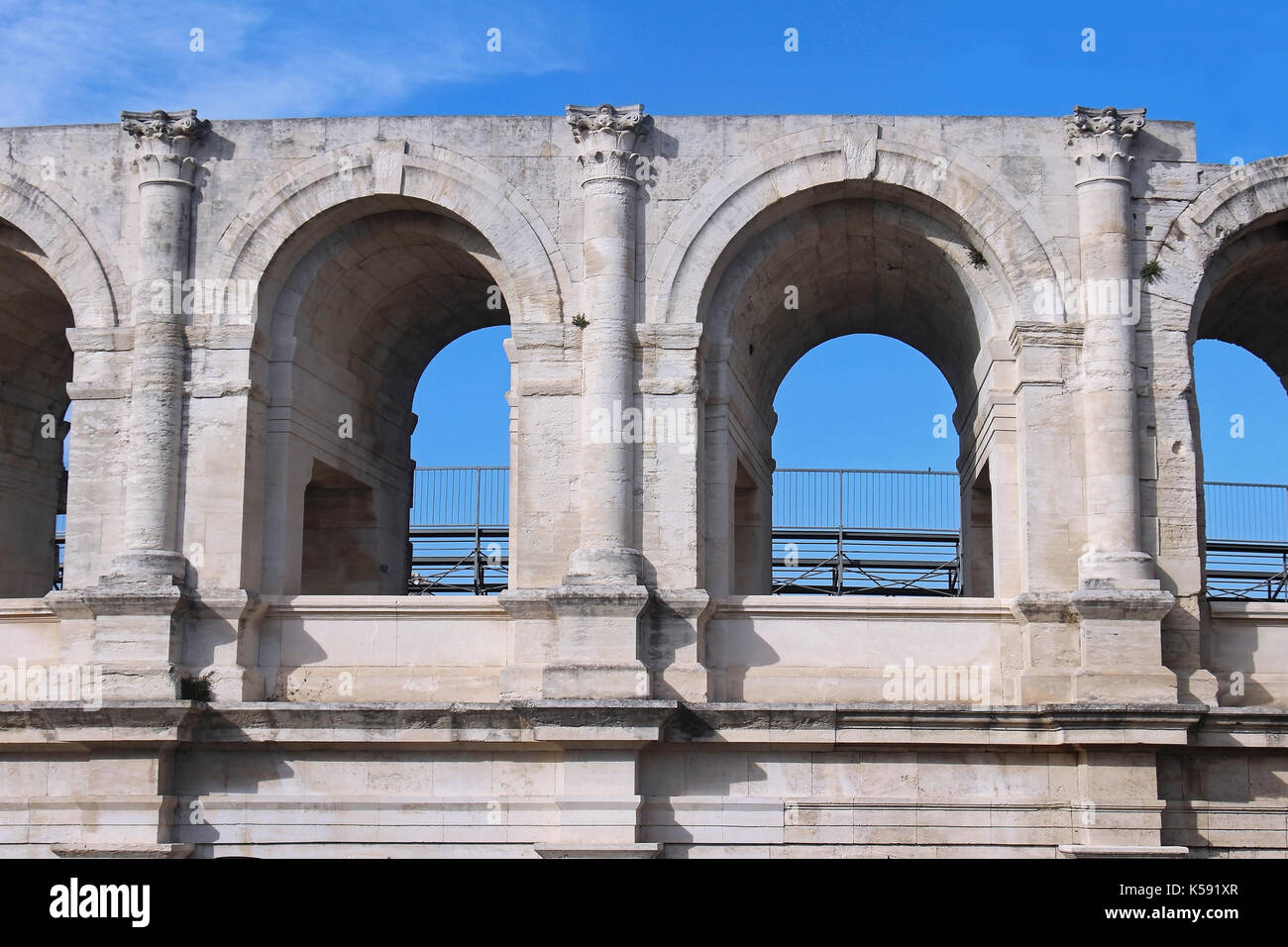 Ancient decayed stone wall architecture detail with arches holes Stock ...