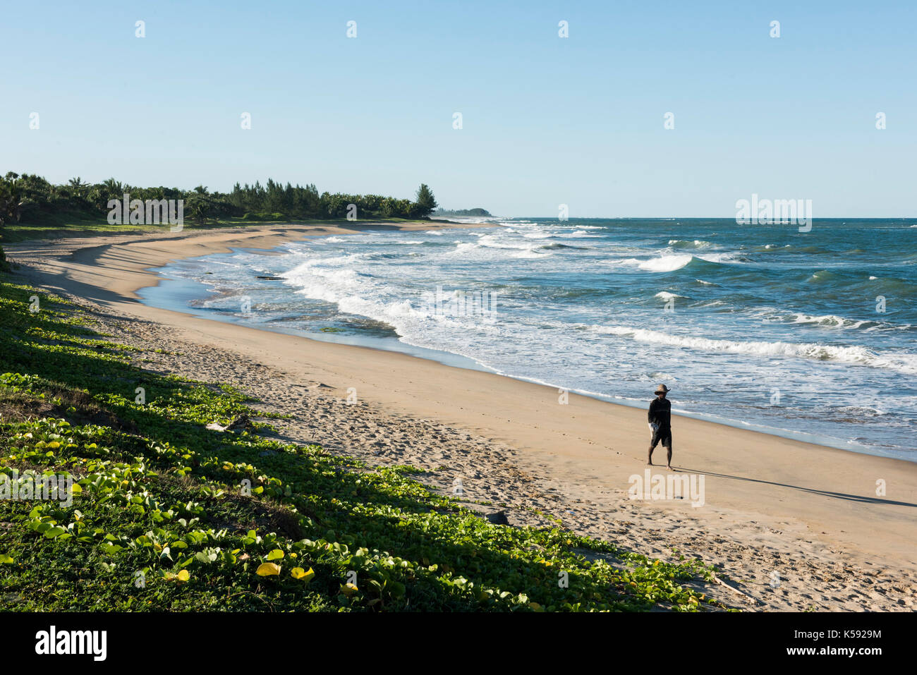 Fisherman walking on the beach, Manakara, Madagascar Stock Photo - Alamy