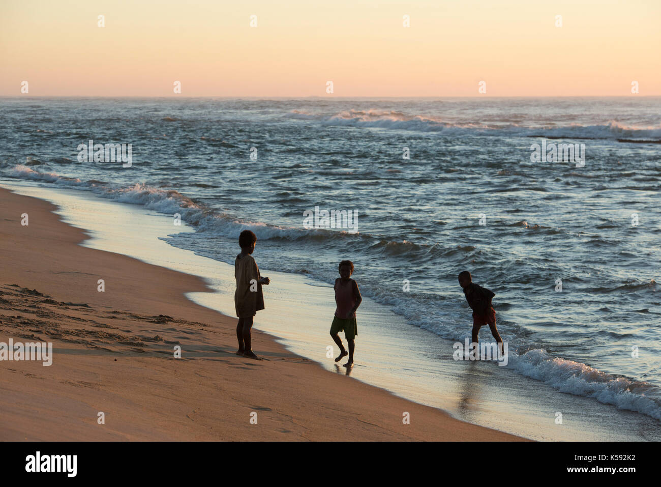Children on the beach at sunrise, Manakara, Madagascar Stock Photo - Alamy