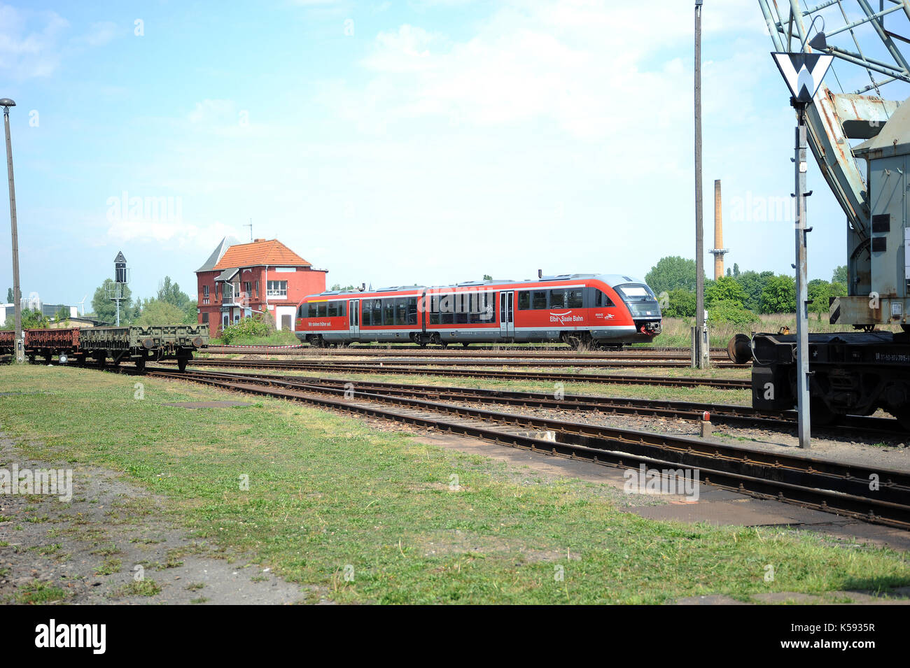D.M.U. passing Stassfurt museum complex on the mainline Stock Photo - Alamy
