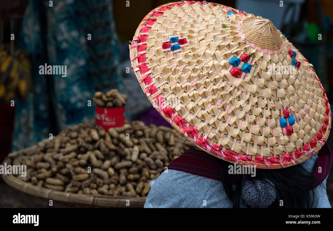 Woman wearing traditional bamboo hat in Myanmar Stock Photo - Alamy