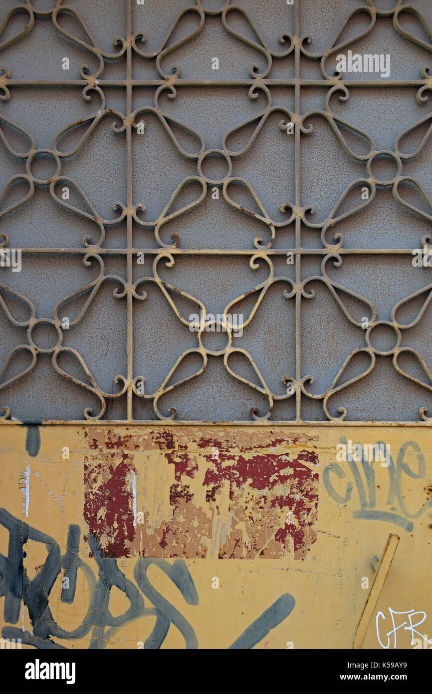 Old metal door pattern with geometric motif and rusty stained surface ...