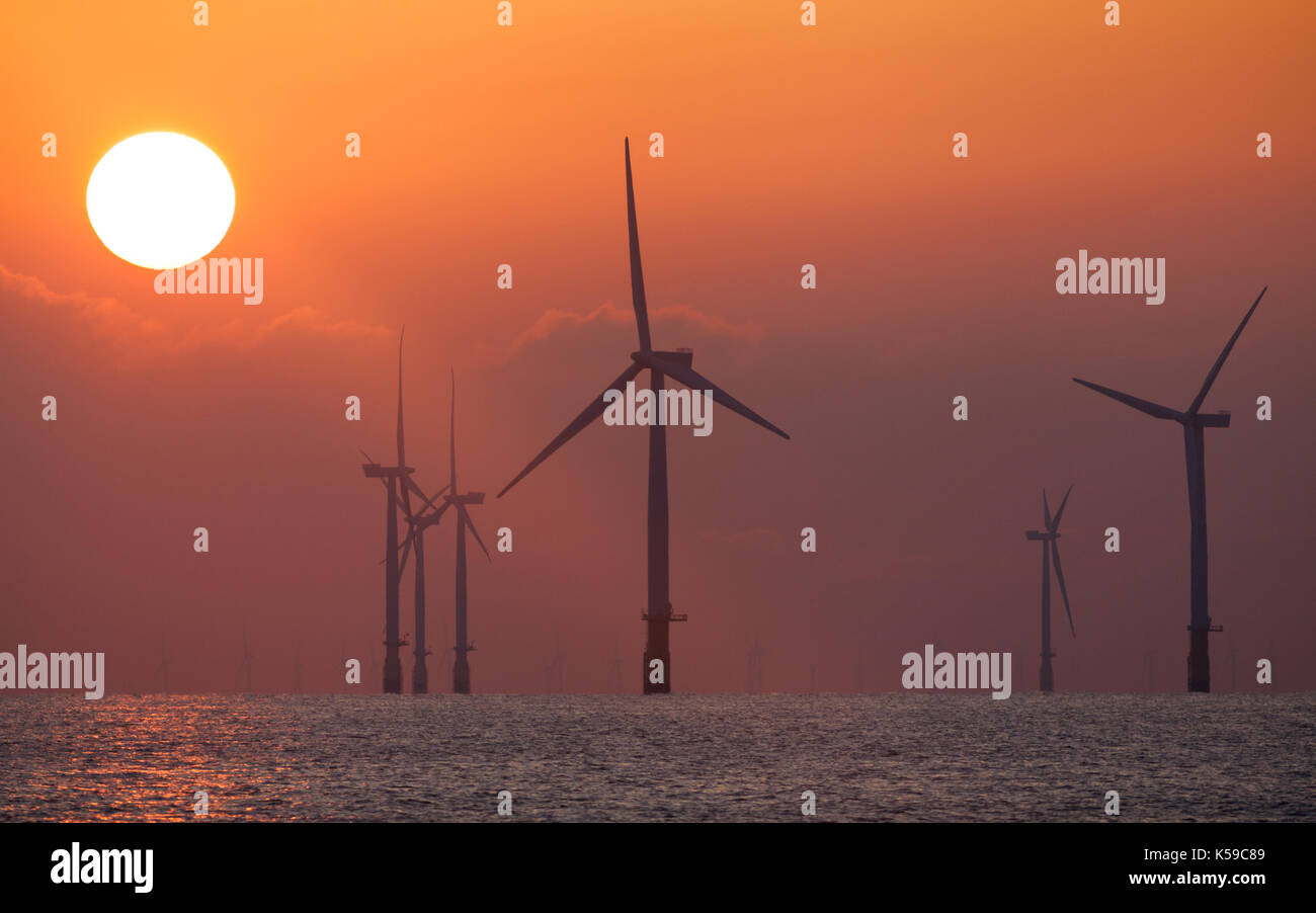 Sunrise over the Lincs Offshore Wind Farm off the coast of Lincolnshire ...