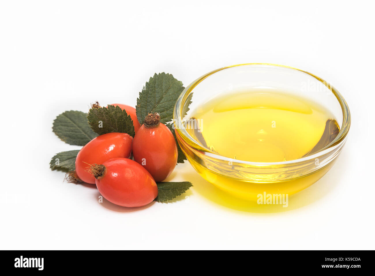 Rose oil cosmetic bottle Cut Out Stock Images & Pictures - Alamy