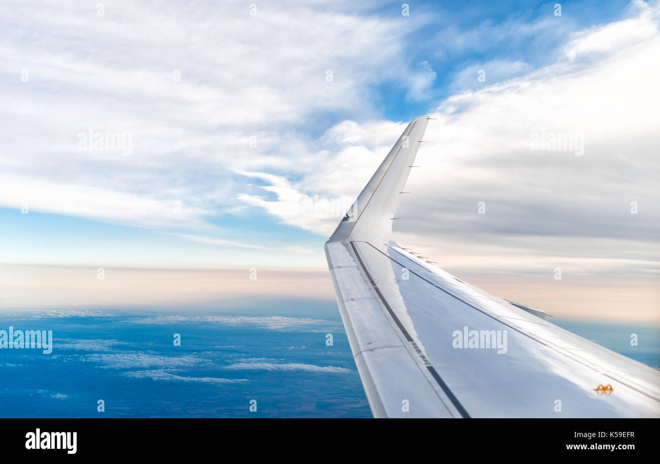 Wing of an airplane, view from window Stock Photo - Alamy