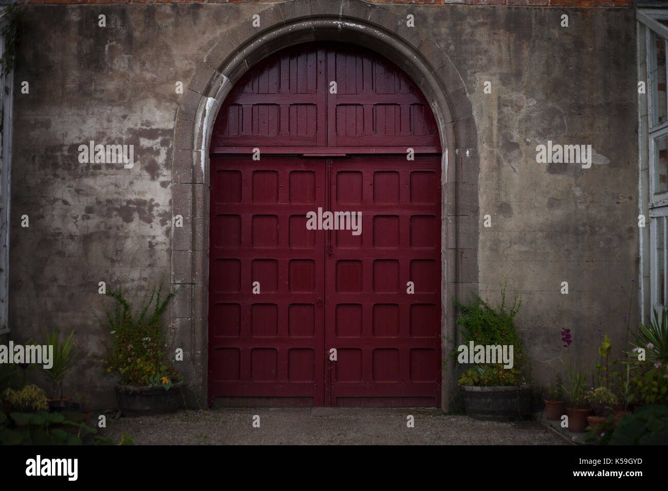 Red wooden door, Glamis Castle, Dundee, Scotland, UK Stock Photo - Alamy