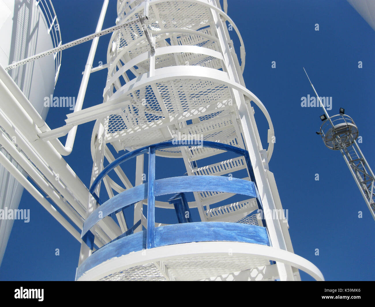 The tank with water and a ladder. Equipment for primary oil refining ...