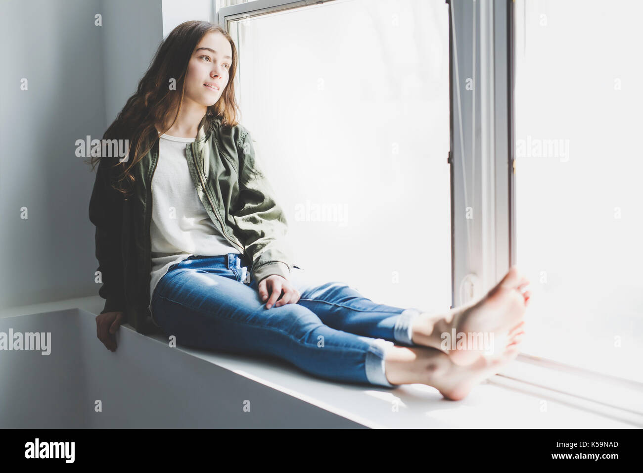 Sad face window child hi-res stock photography and images - Alamy