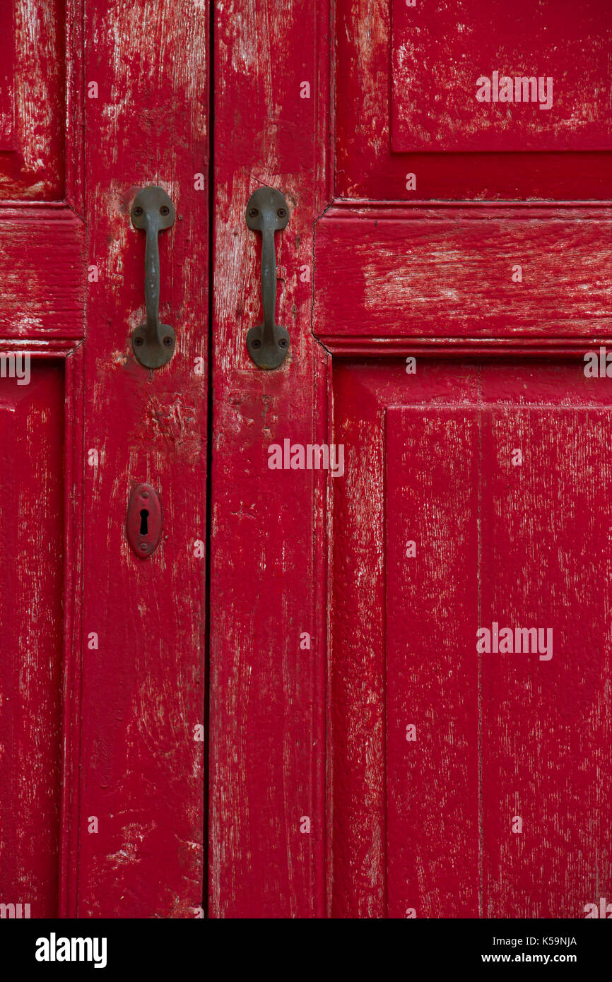 Red wooden closed door on white background Stock Photo - Alamy