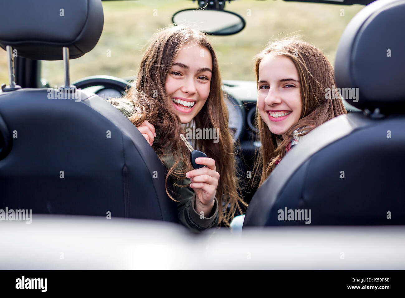 Teenage woman driving car hi-res stock photography and images - Alamy