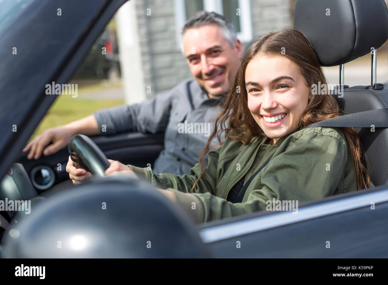 Teen learning to drive or taking driving test Stock Photo - Alamy