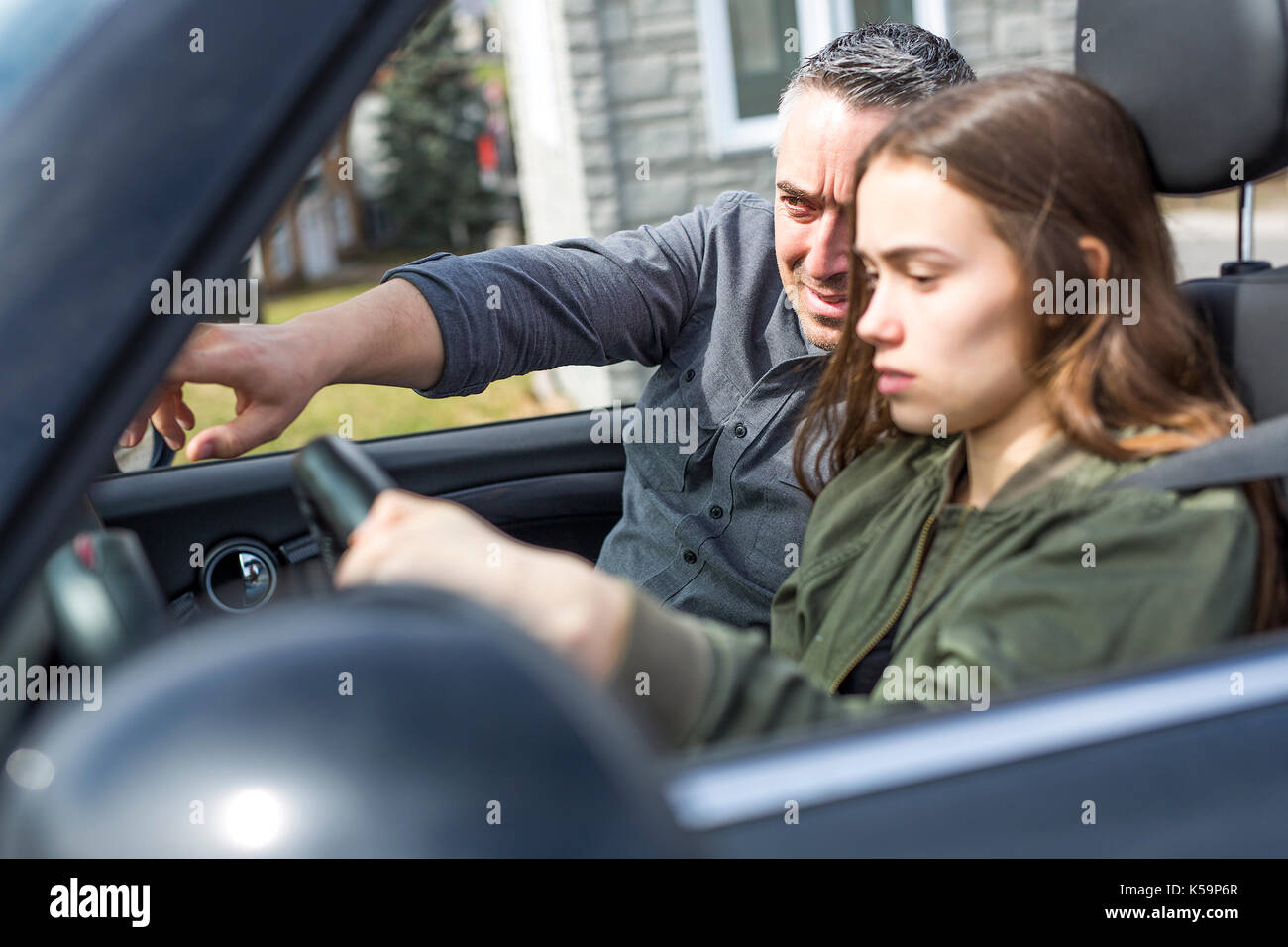 Teen learning to drive or taking driving test Stock Photo - Alamy