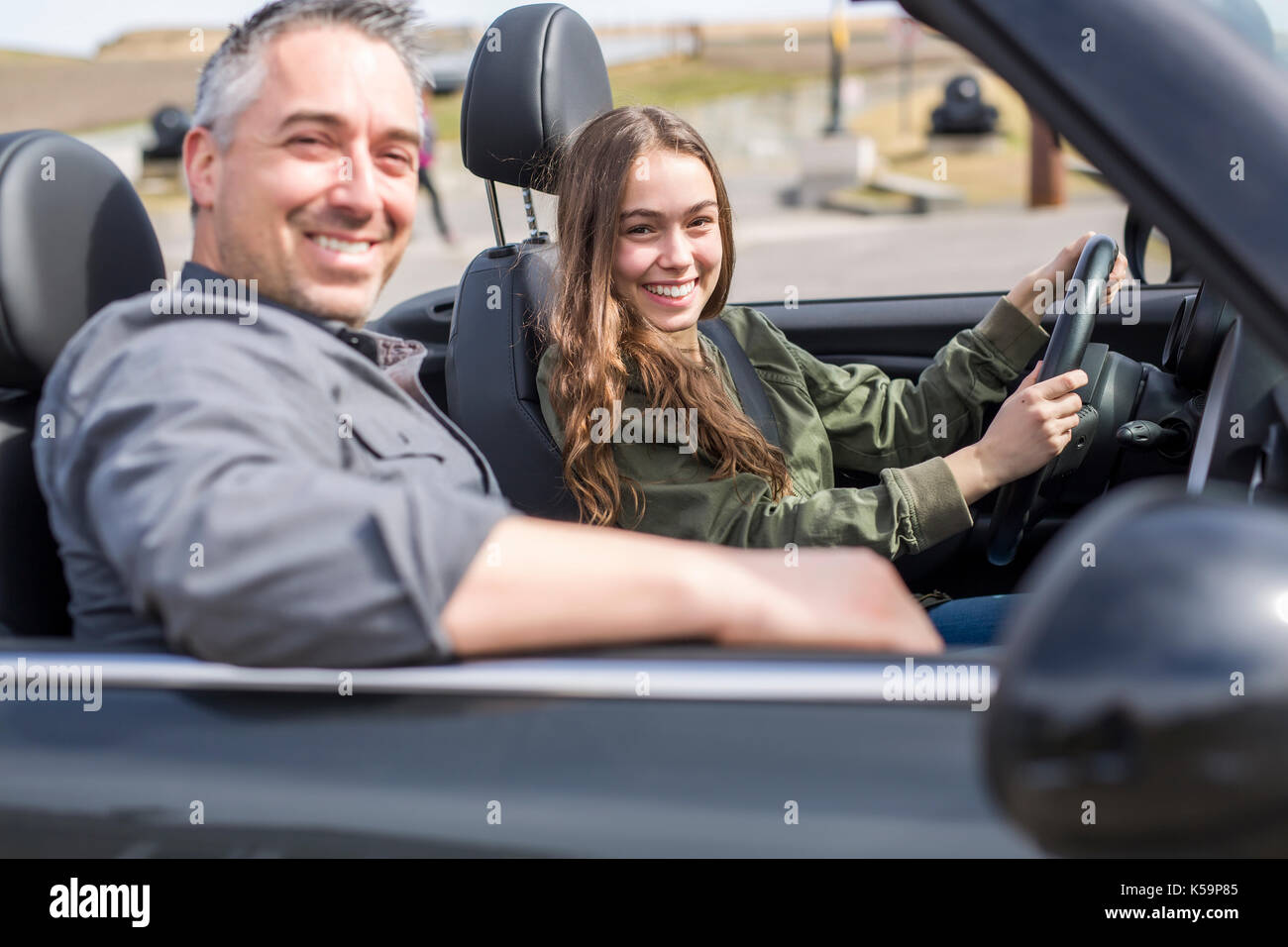 Teen learning to drive or taking driving test Stock Photo - Alamy