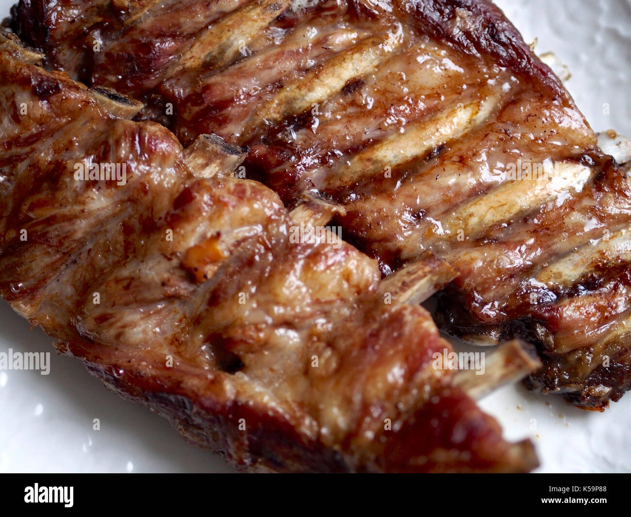 Roasted sliced barbecue ribs pork Stock Photo - Alamy