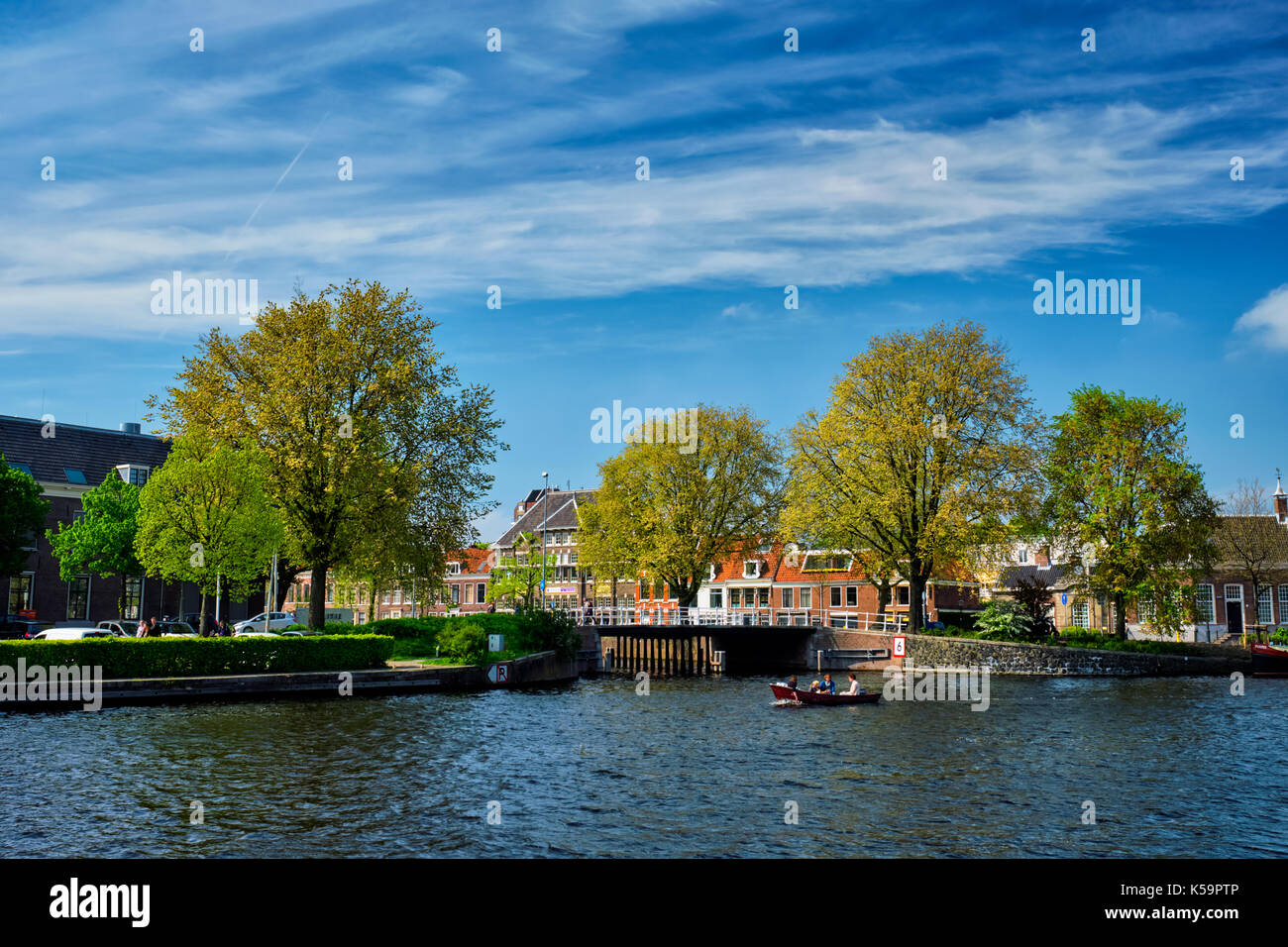 Boat in canal and Spaarne river in Haarlem, Netherlands Stock Photo - Alamy