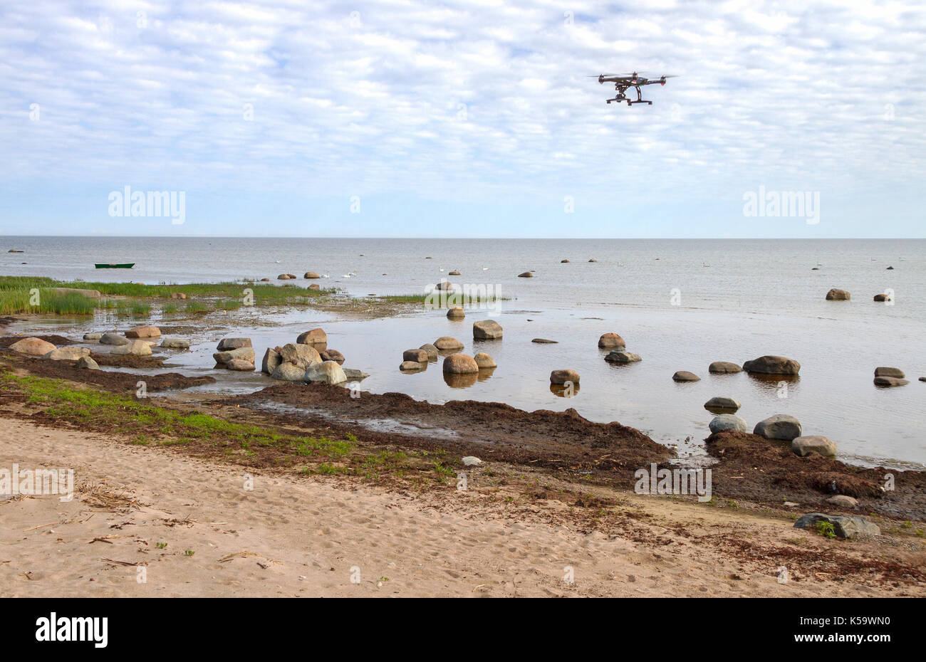 Stone Baltic sea in a spring time - paradise for birds. Flying drone ...