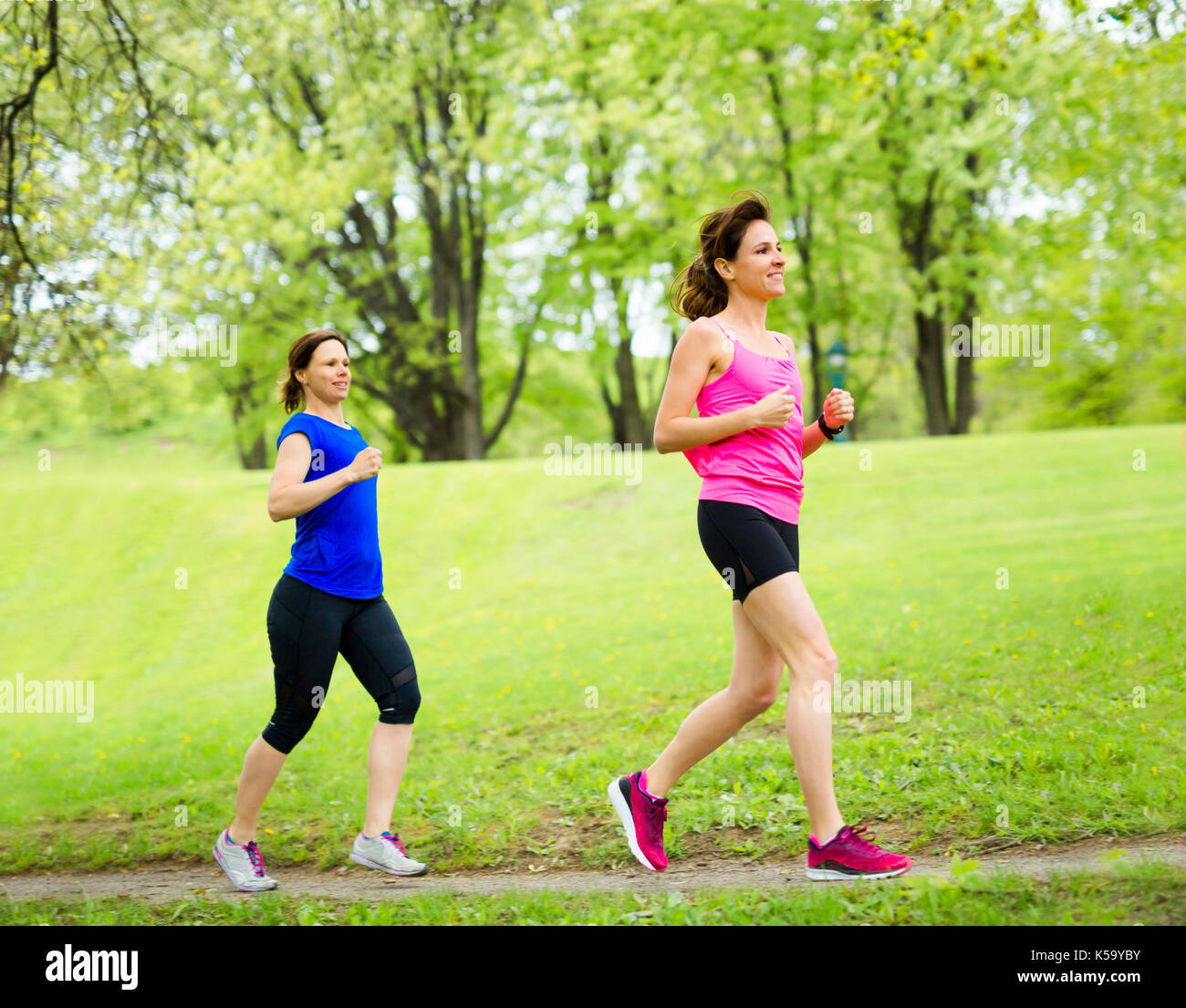 Two Beautiful Female Joggers Stock Photo - Alamy