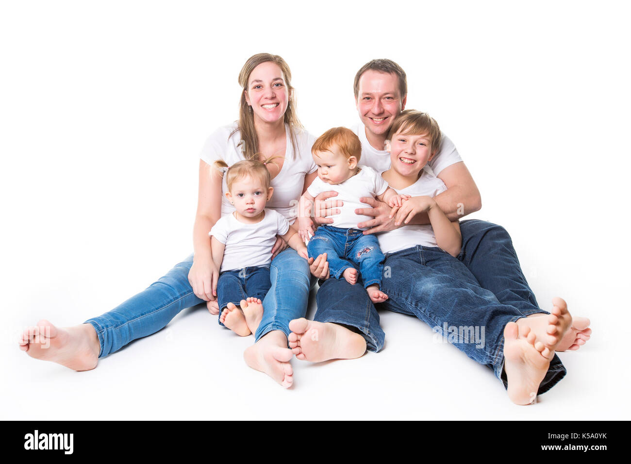 attractive portrait of young happy family over white background Stock ...