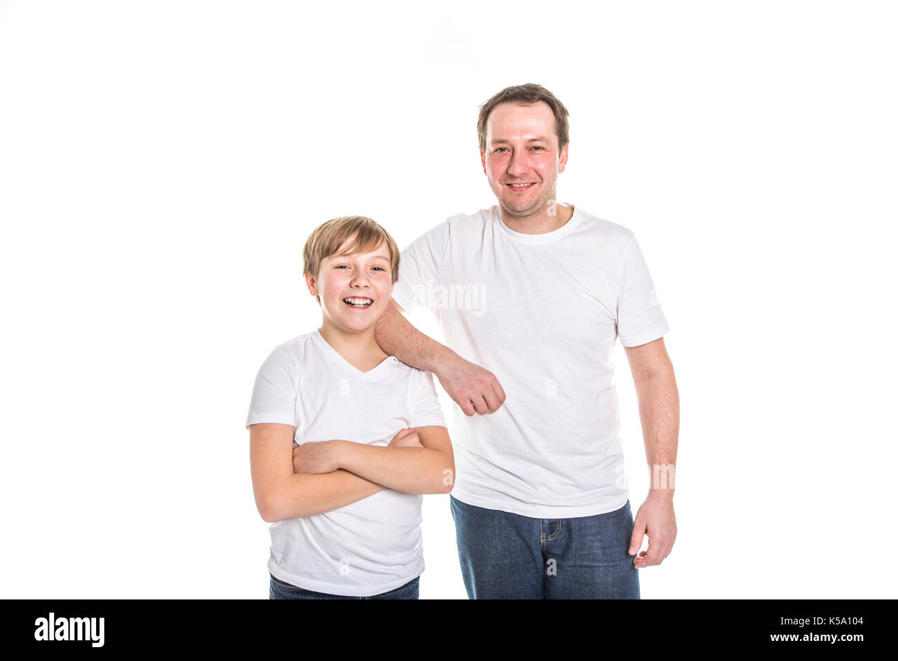Father and son standing, isolated on white background Stock Photo - Alamy