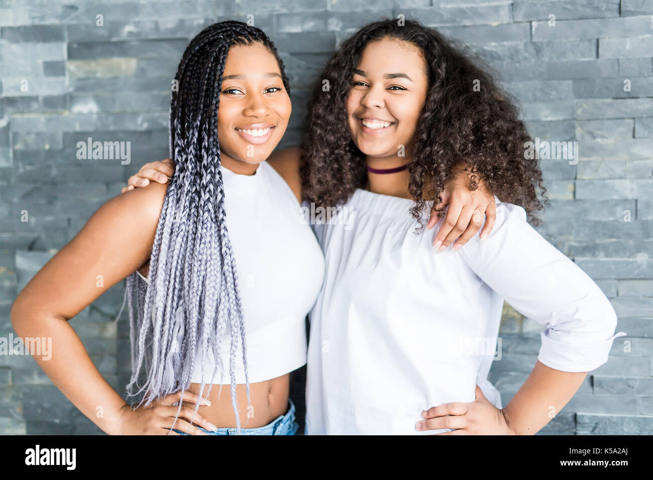 Two young afro girls having fun together Stock Photo - Alamy