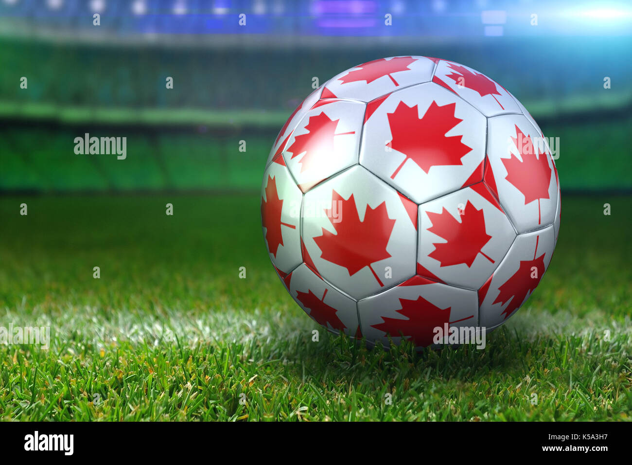 Canada Soccer Ball on Stadium Green Grasses at Night Stock Photo - Alamy