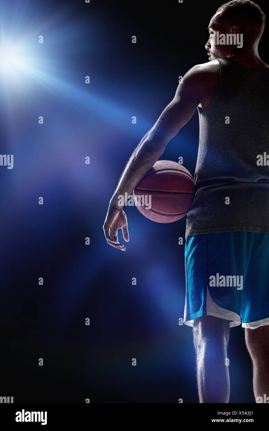 The portrait of a basketball player with ball Stock Photo - Alamy
