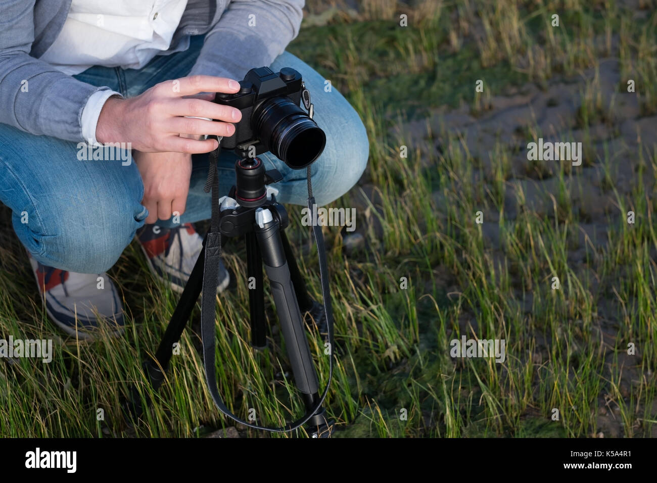 Man with camera Stock Photo - Alamy