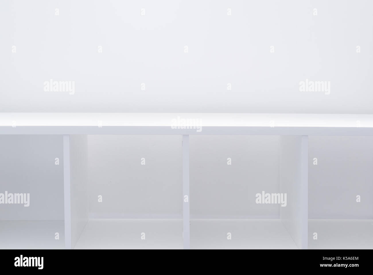 Empty office or bookcase library shelves with blank copy space for ...