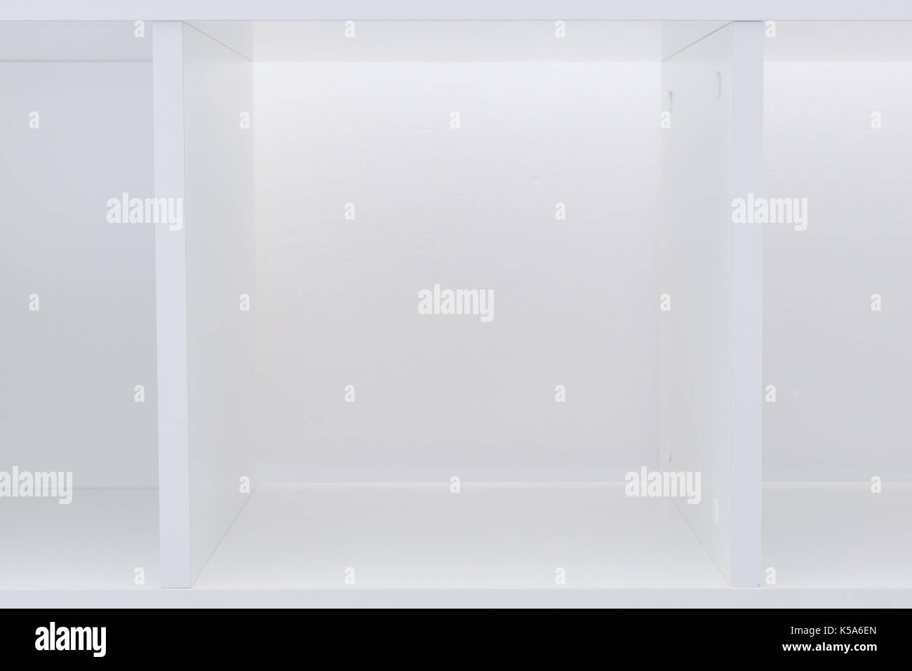 Empty office or bookcase library shelves with blank copy space for ...