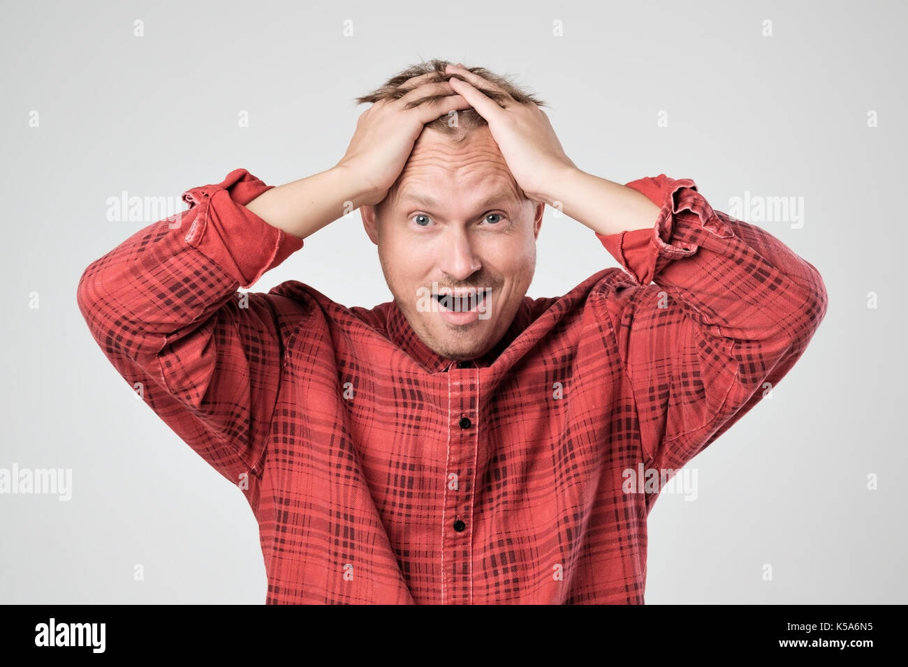 Shocked facial expression hi-res stock photography and images - Alamy