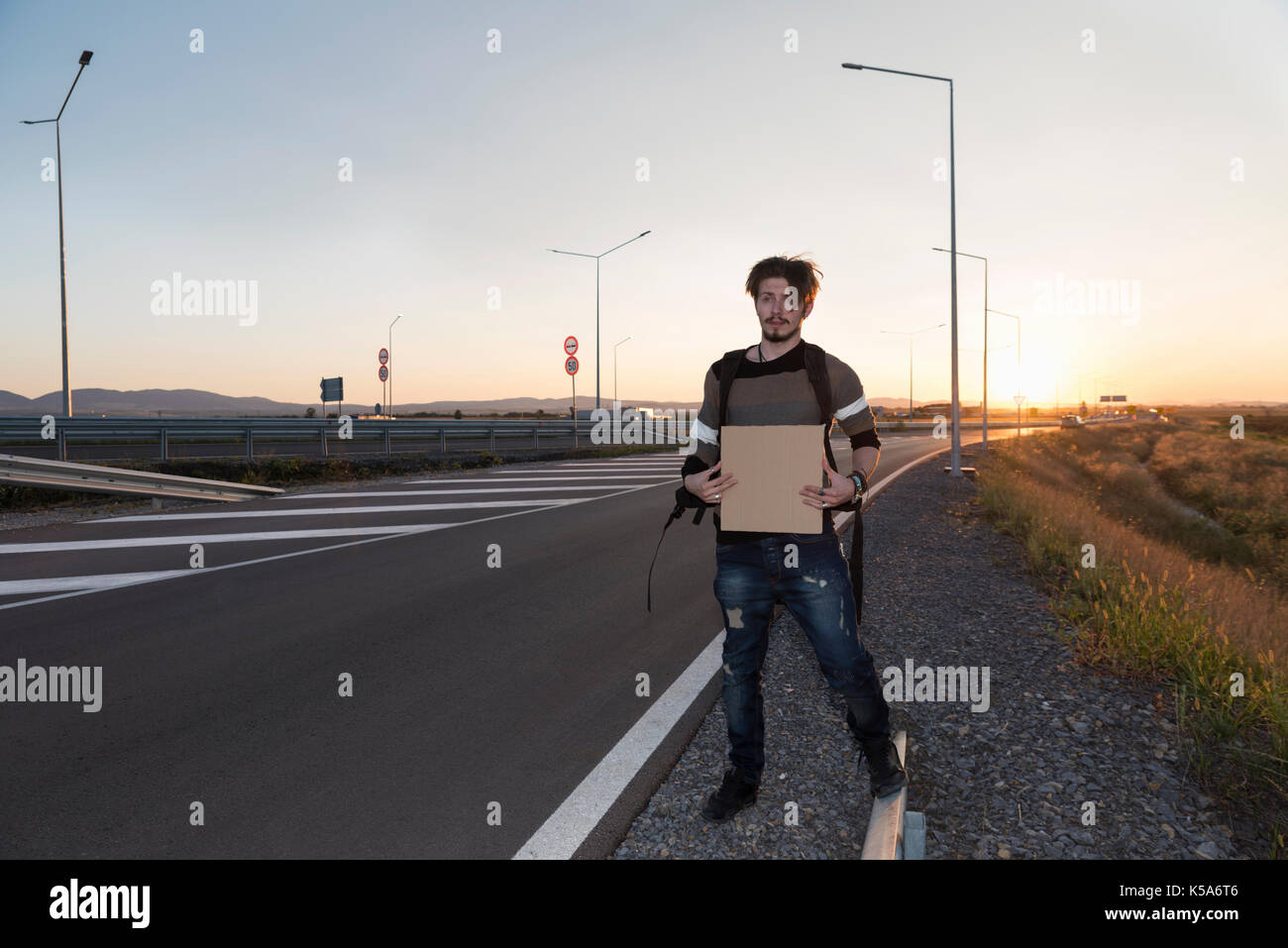 Thumbing a ride hi-res stock photography and images - Alamy