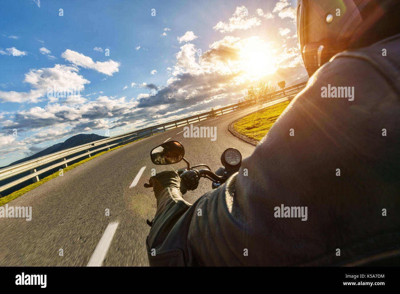 Detail of motorcycle handlebars. View from driver perspective ...