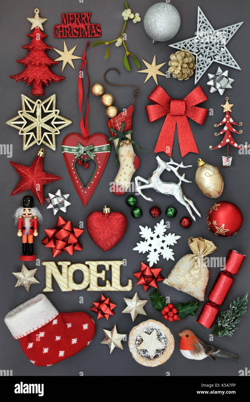 Christmas symbols with gold noel sign, new and old fashioned bauble ...