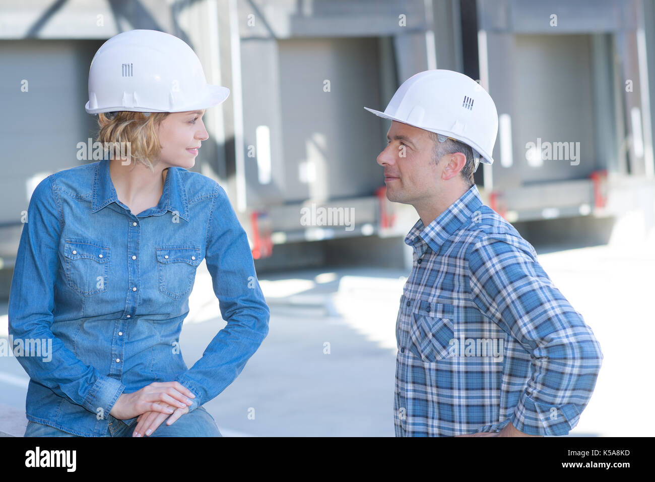 warehouse management employees at docking area Stock Photo - Alamy