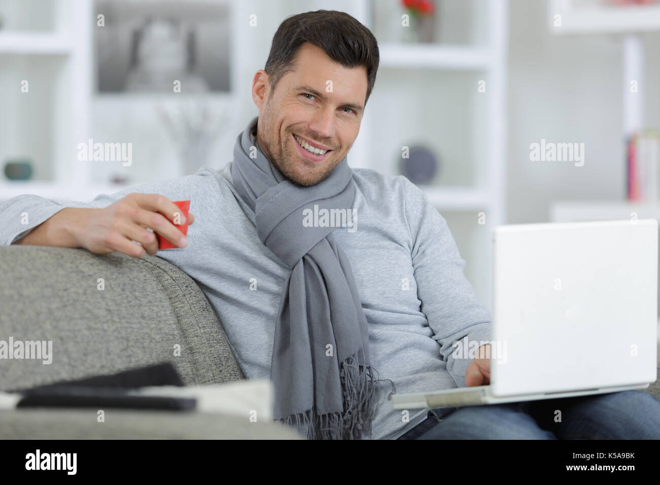man with laptop smiling Stock Photo - Alamy
